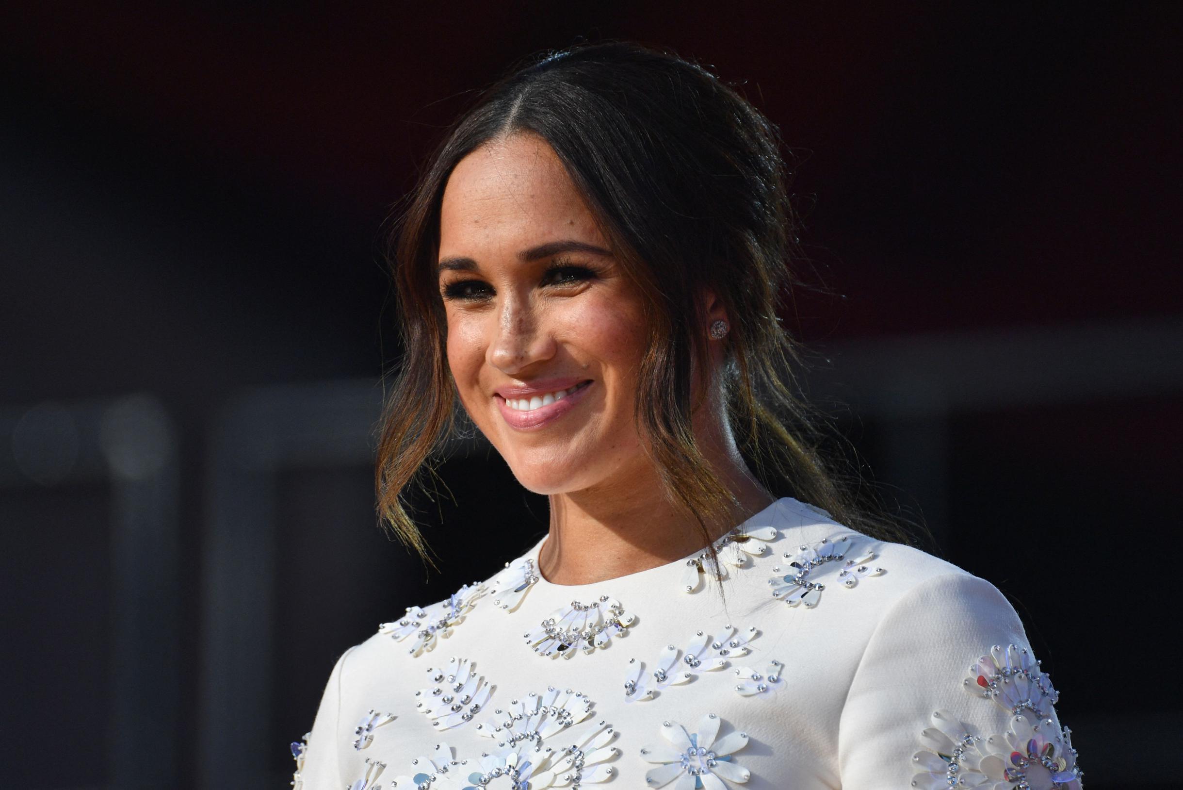 Meghan Markle stoot podcastkoning Joe Rogan van de troon op Spotify ...